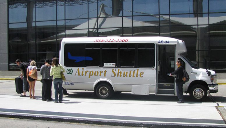 วิธีเดินทางเข้าเมืองจากสนามบิน New Orleans ด้วย Airport Shuttle Bus ...